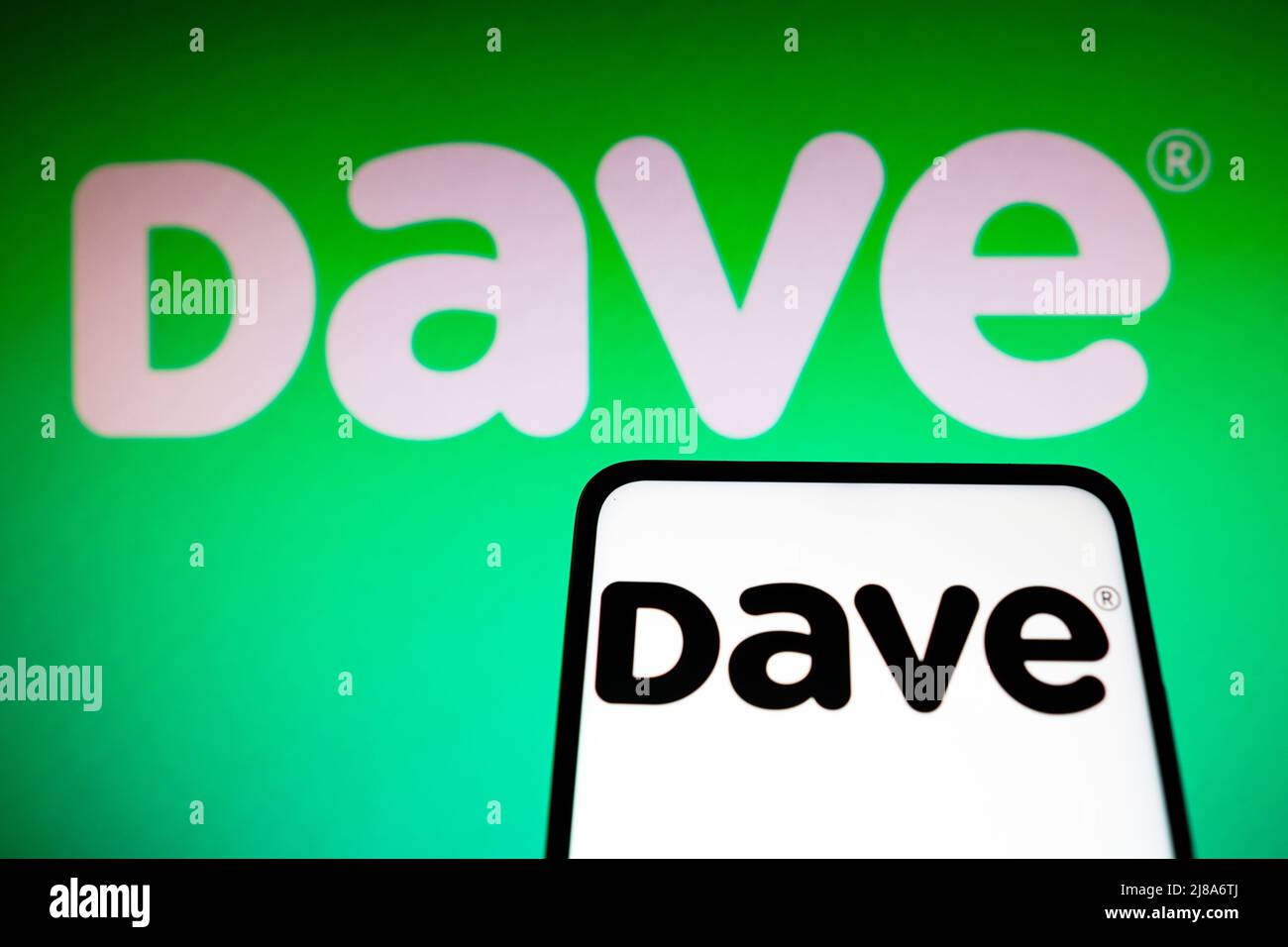 In this photo illustration the Dave Inc. logo seen displayed on a ...