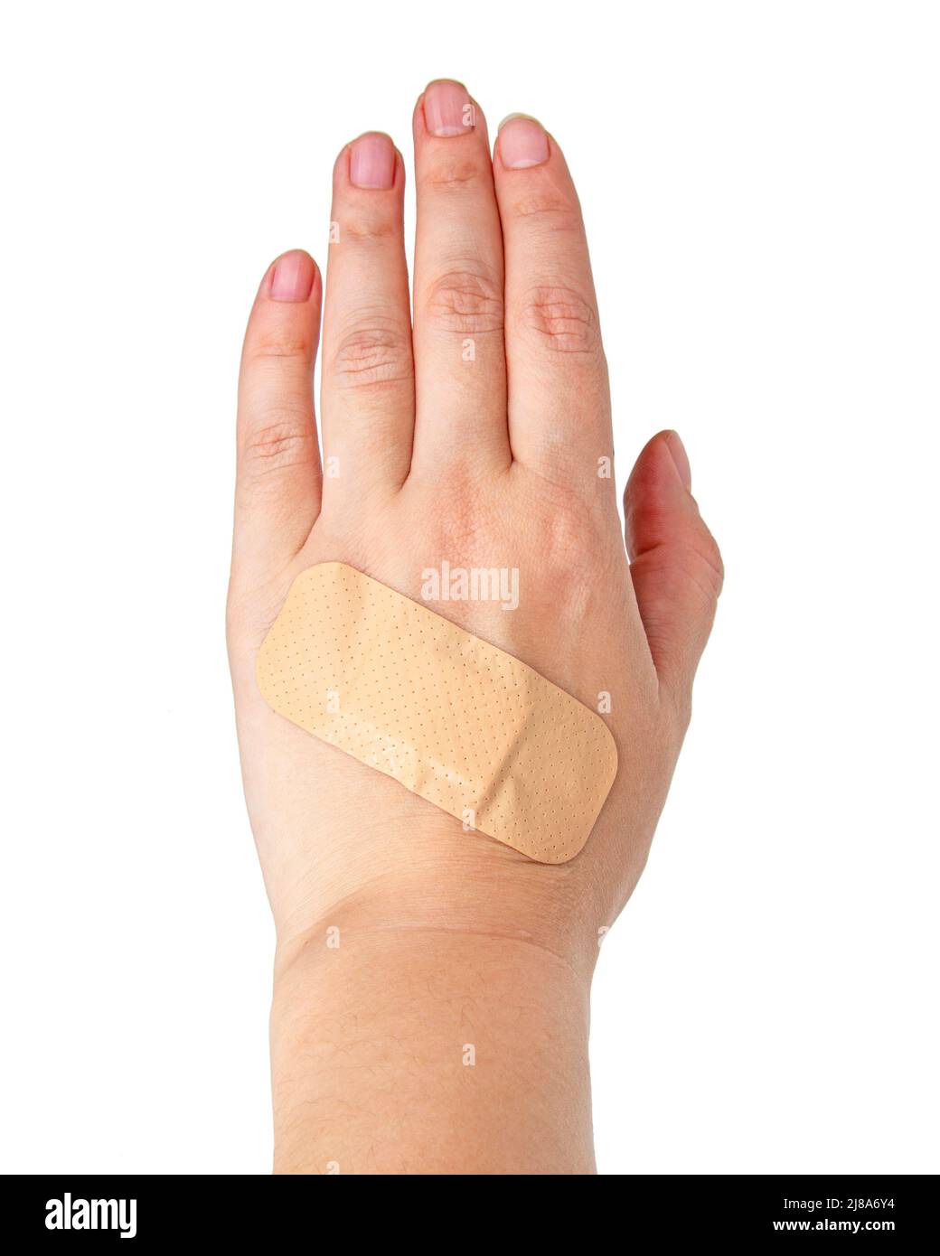 Medical big elastic plaster on woman hand isolated on the white ...