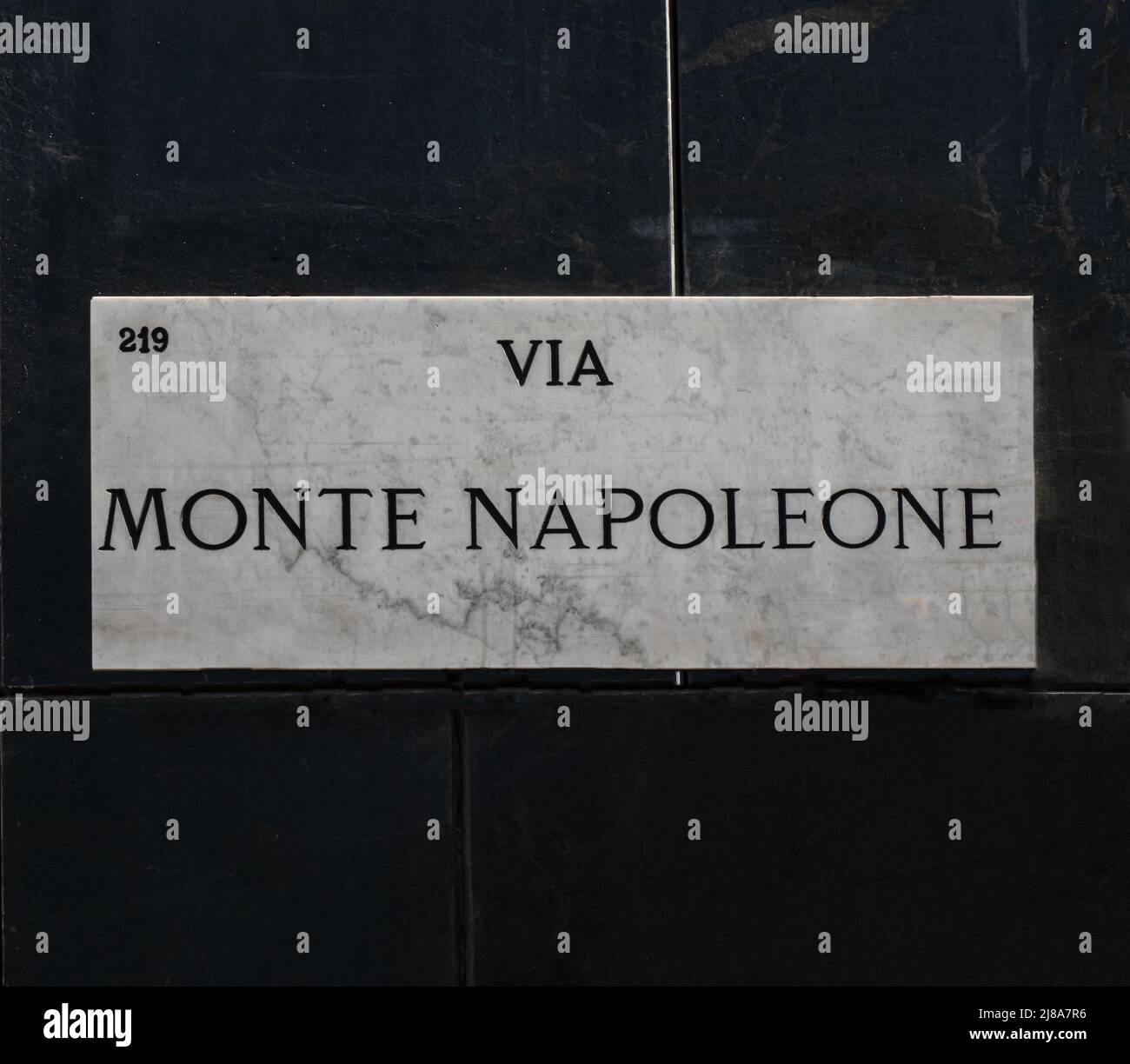 road sign engraved on marble of the historical via Montenapoleone in ...