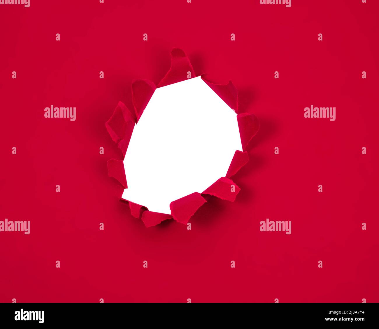 Red crushed torn paper with hole copyspace background for idea Stock ...