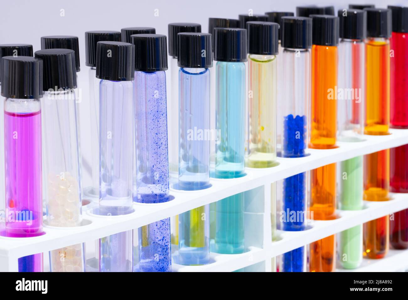 Medical or chemical background with laboratory equipment and liquids ...