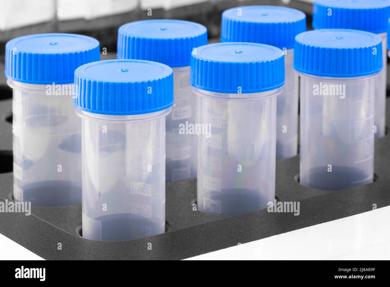 Medical or chemical background with laboratory equipment and liquids ...