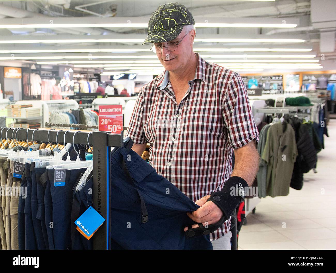 Serge Guay shops in a sports store in Montreal, Saturday, May 14, 2022 ...