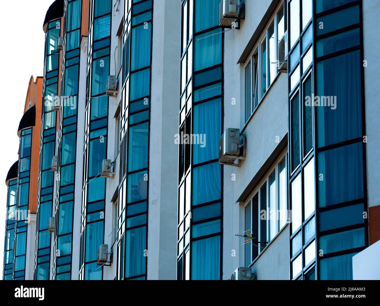 Exterior view of a modern multi-storey residential building. Facade ...