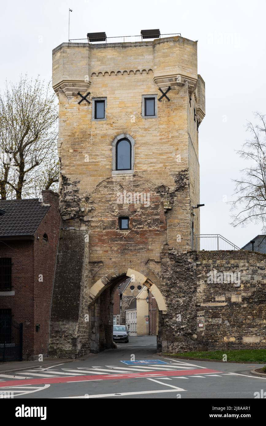 Tongeren, Limburg, Belgium - 04 04 2022- The Moerenpoort, a medieval city gate tower on a rainy ...