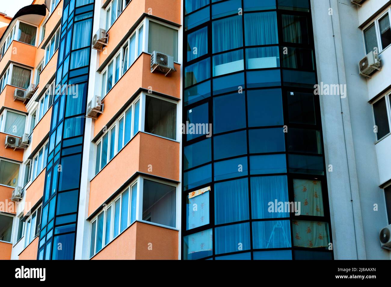 Exterior view of a modern multi-storey residential building. Facade ...