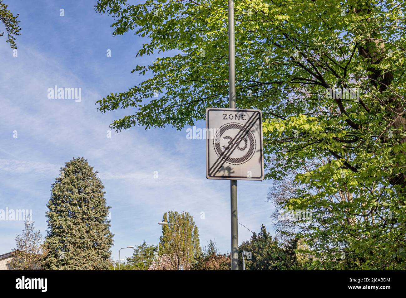 Traffic sign: 30 km zone ends, white sign with the number 30 inside a ...