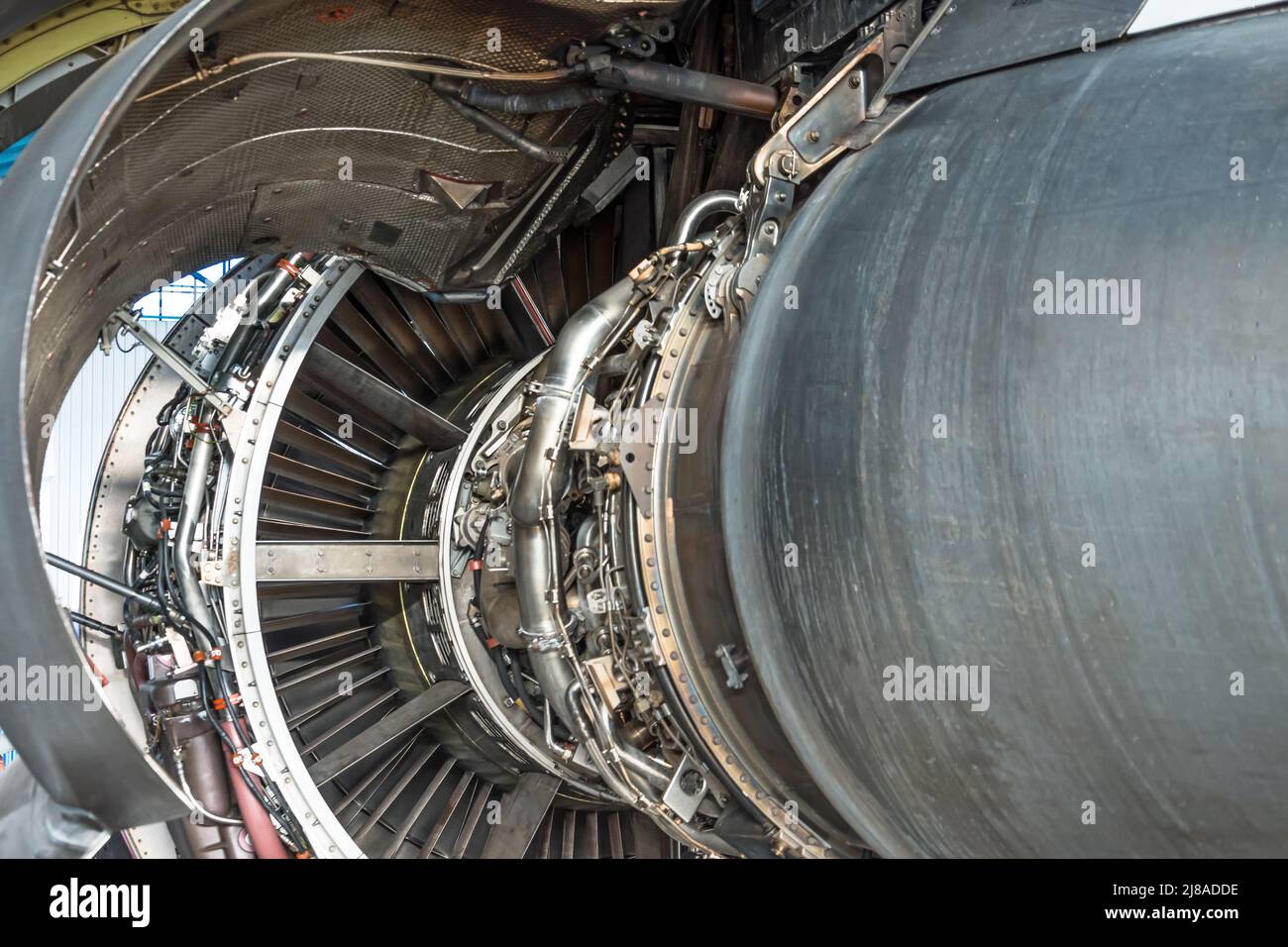Airplane engine disassembled open hood, rear view Stock Photo - Alamy