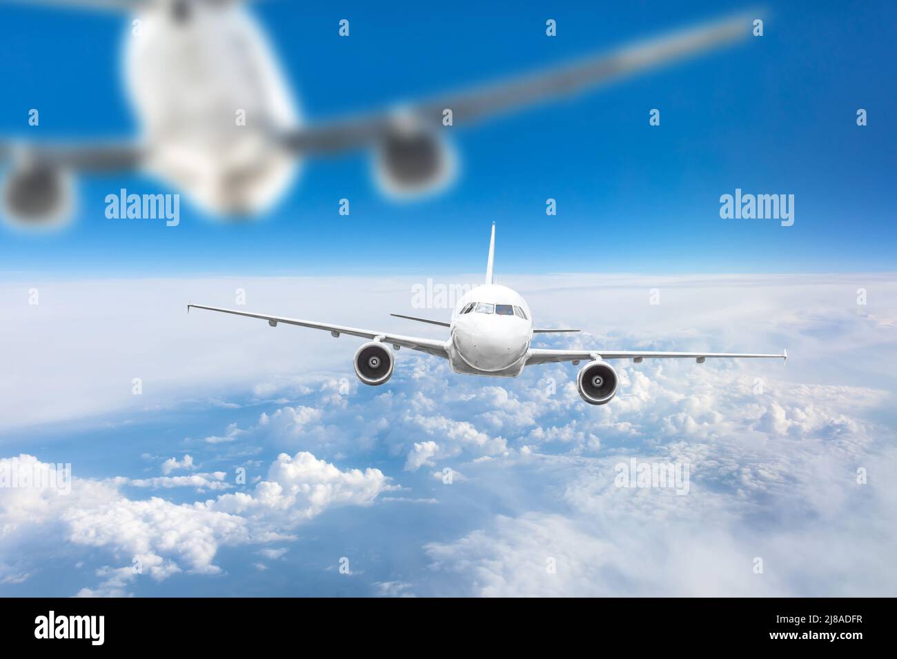 Two planes in the sky on a dangerous approach, distance is close ...