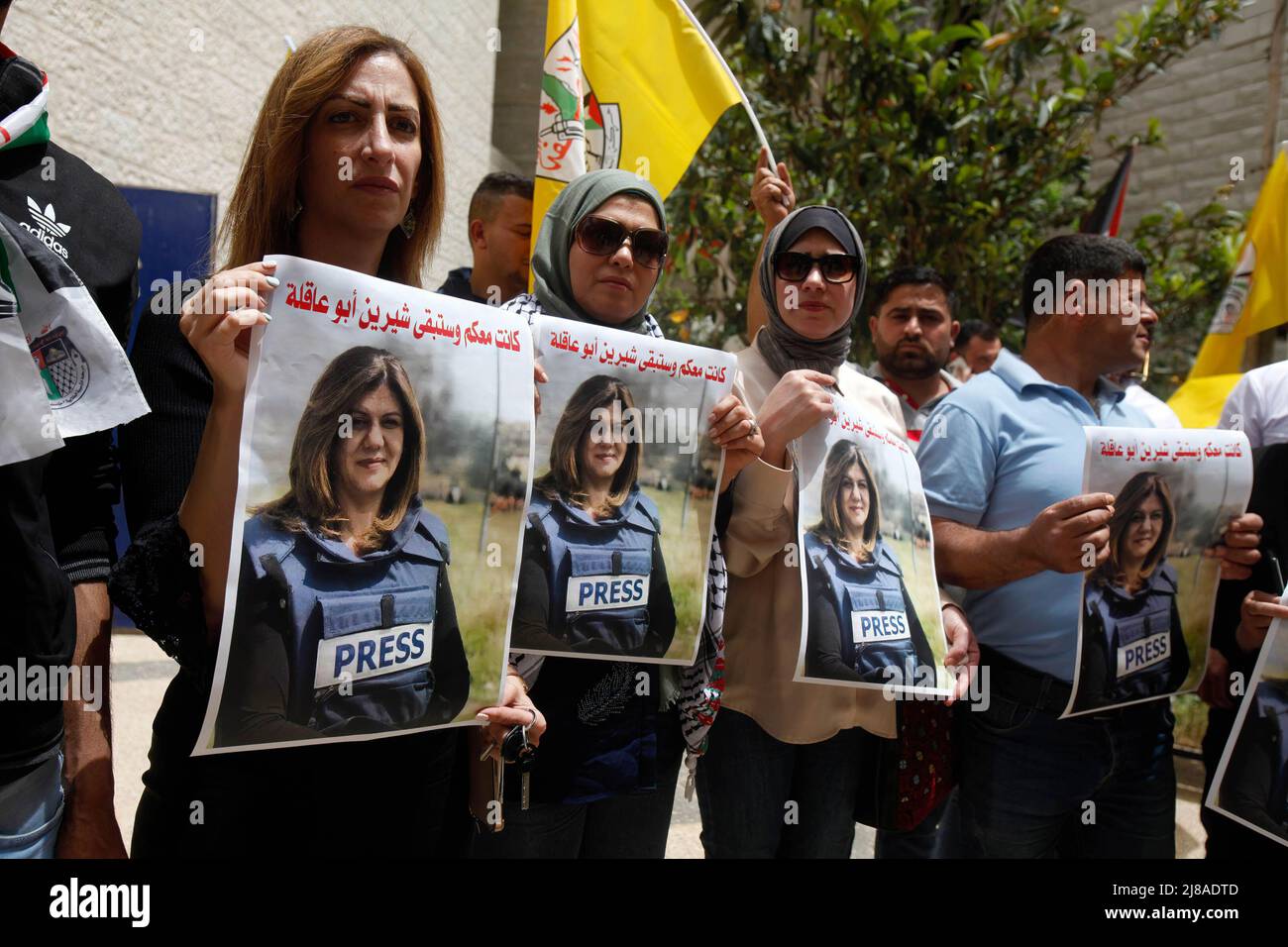 Nablus, Palestine. 14th May, 2022. Palestinian students hold pictures ...