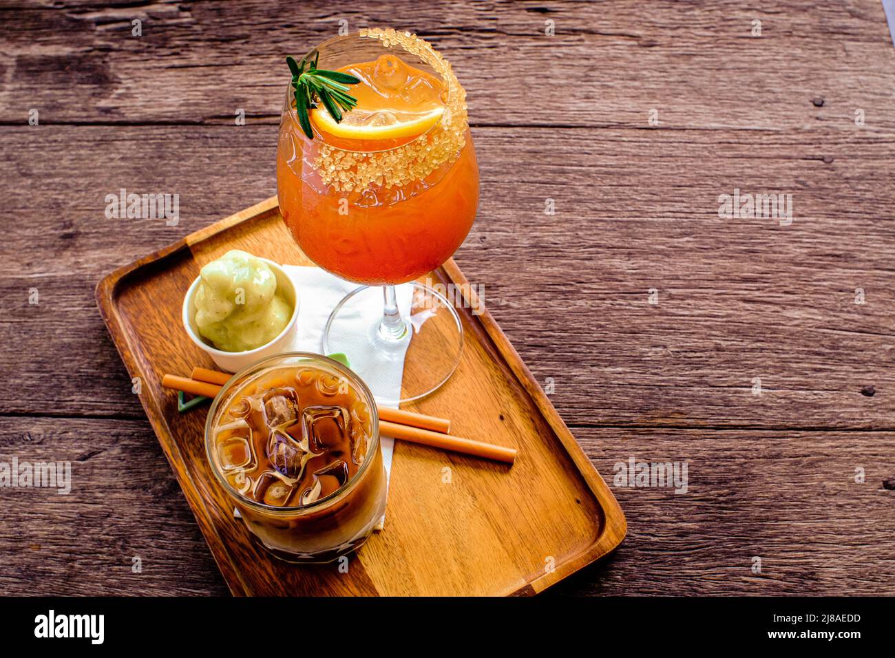 Fresh summer drink mocktail pour in glass on wooden plate Stock Photo ...