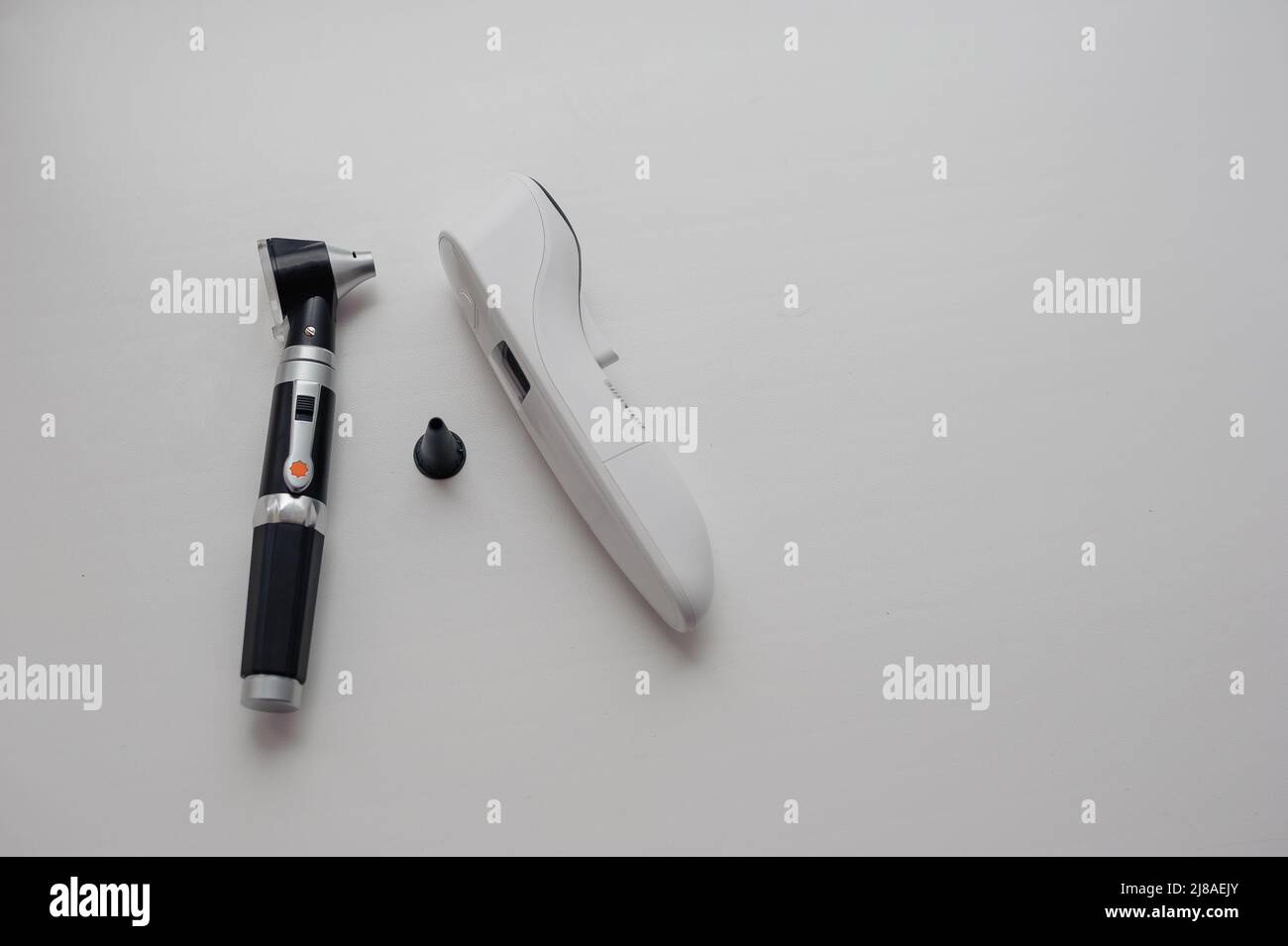 Non-contact thermometer on a white background for measuring body ...