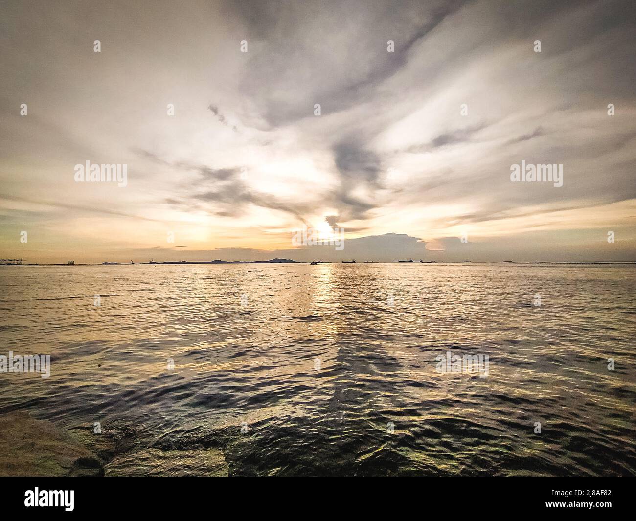Sunset sky and water scenes ship landscape hi-res stock photography and ...