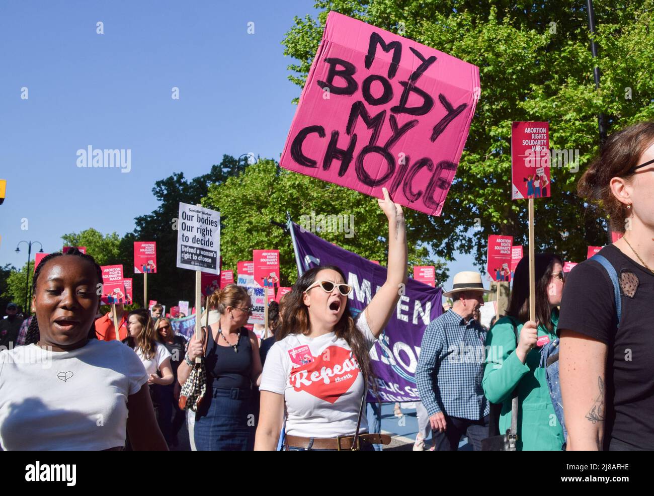 London, England, UK. 14th May, 2022. A protester holds a 'My body, my ...