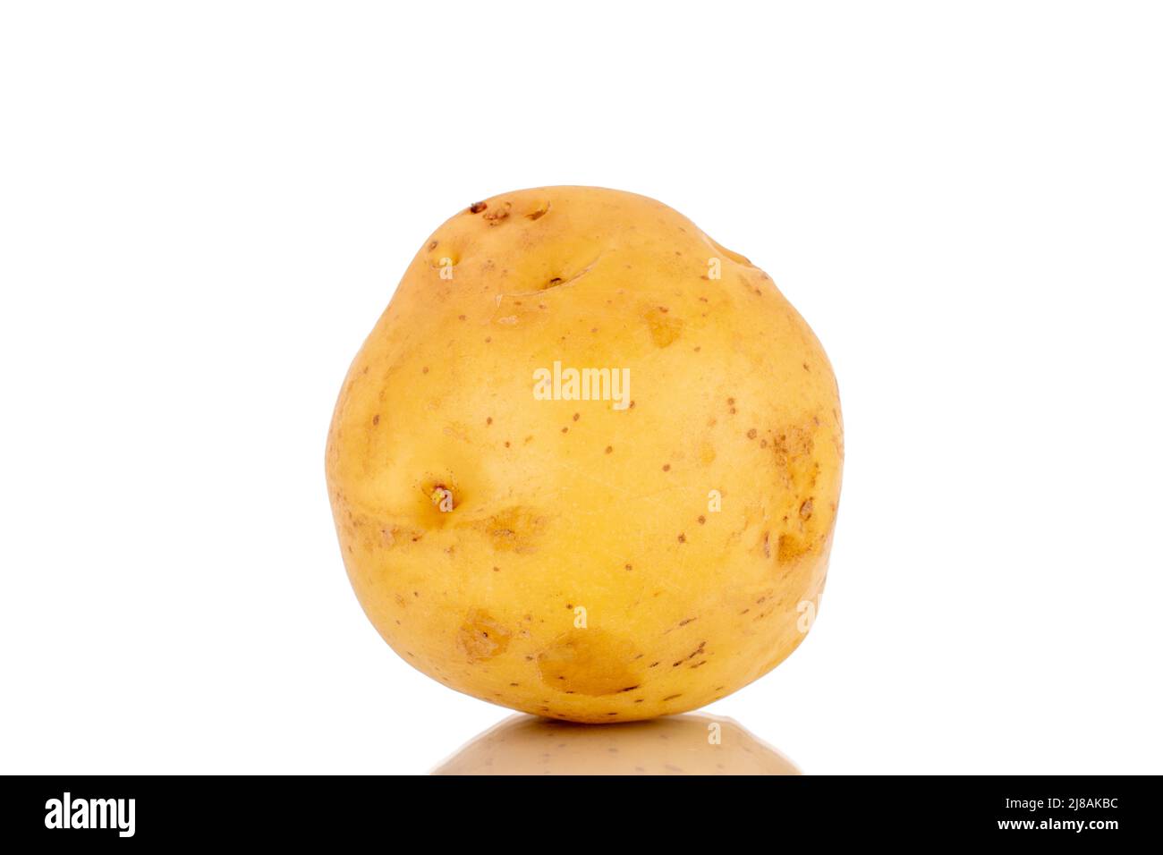 One raw organic potato, close-up, isolated on white background Stock ...