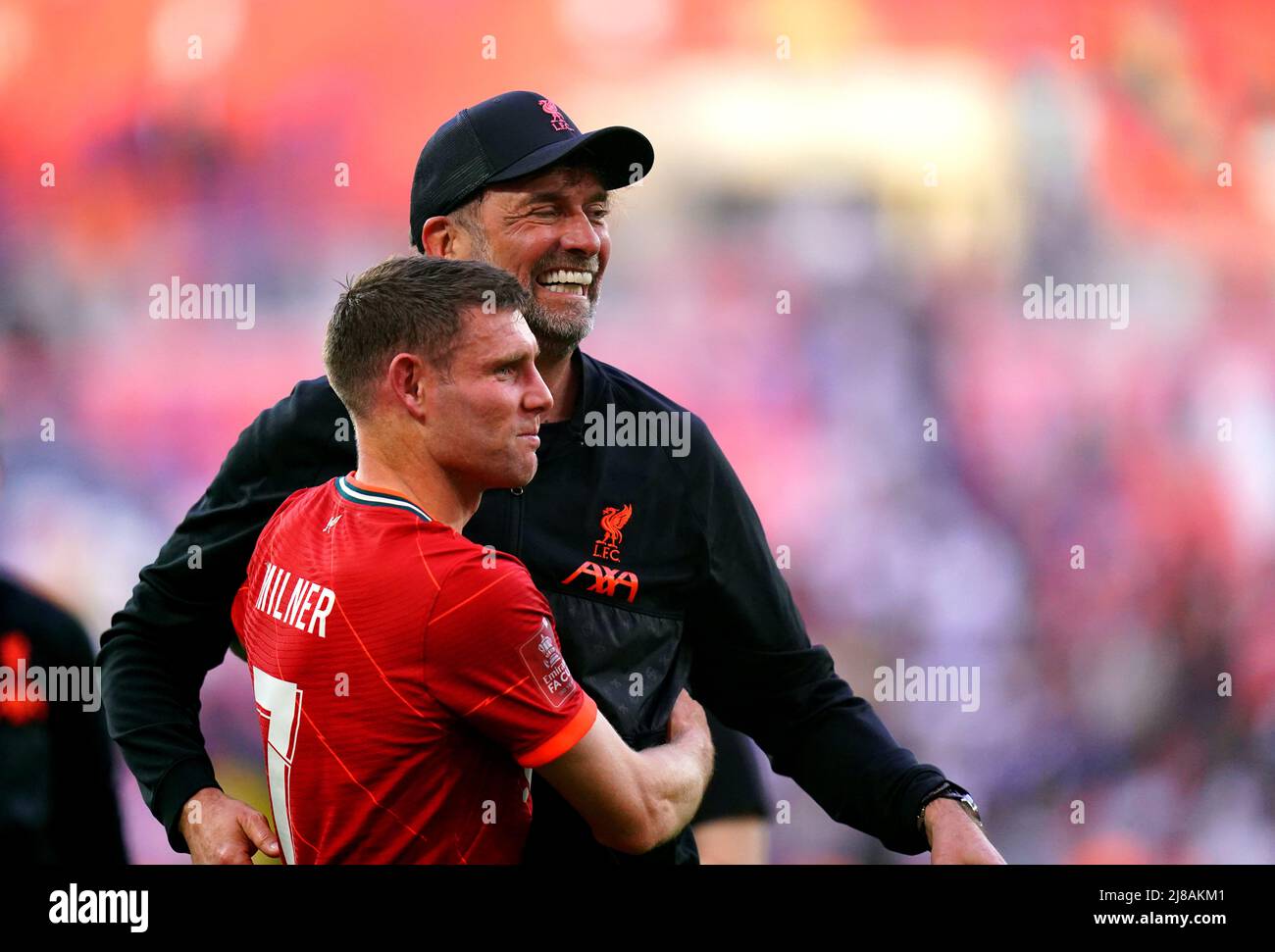 Liverpool manager Jurgen Klopp hugs James Milner as they celebrate ...