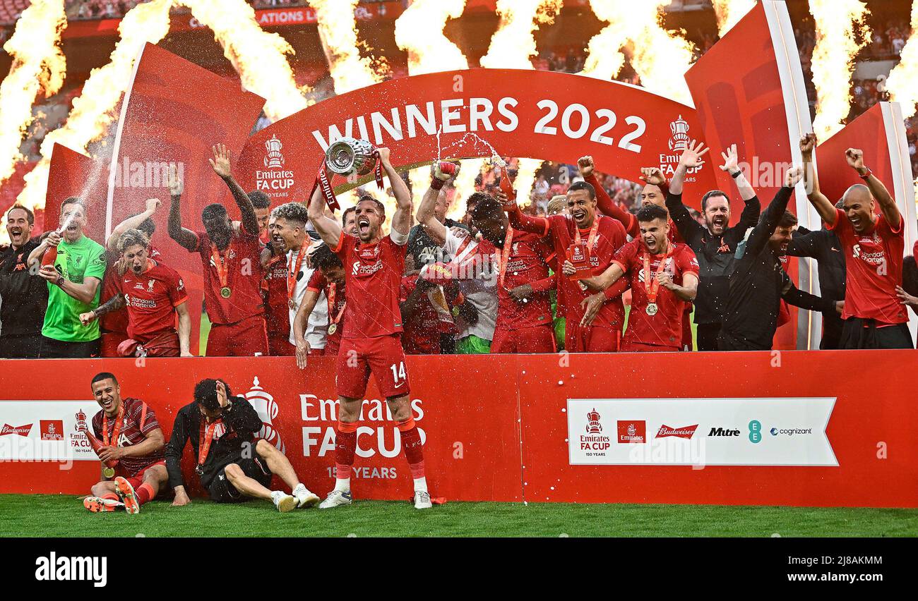 London, UK. 14th May, 2022. Jordan Henderson (Liverpool) holds the FA ...