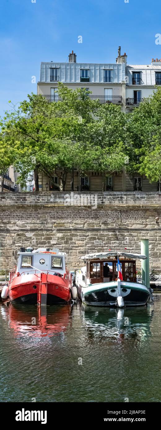 Paris, Bastille, beautiful harbor with houseboats, and typical facade ...