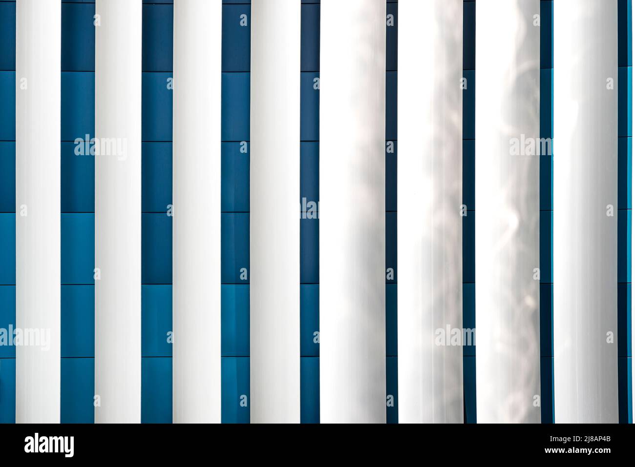 The facade of a modern building with an innovative facade made of ...