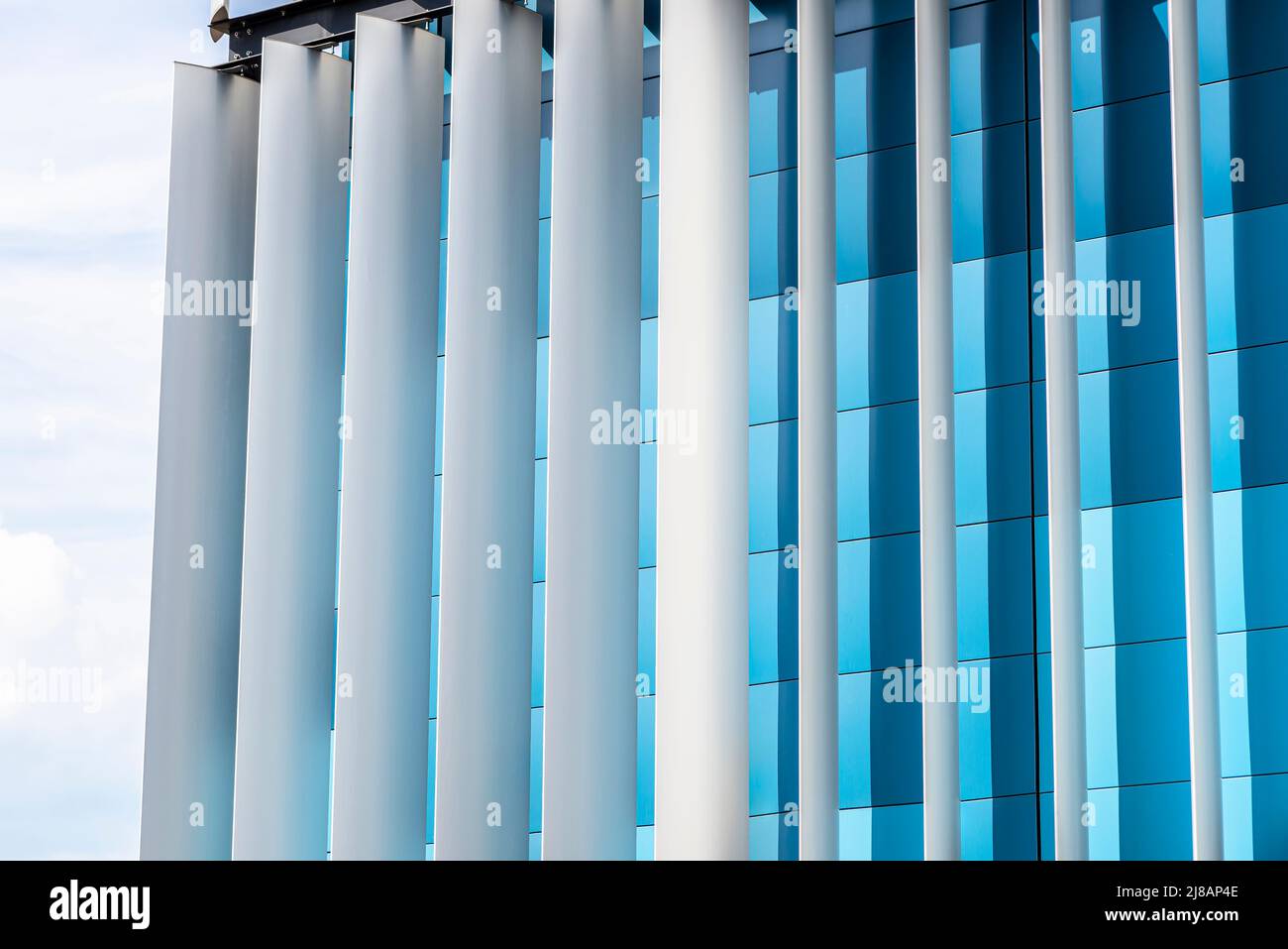The facade of a modern building with an innovative facade made of ...