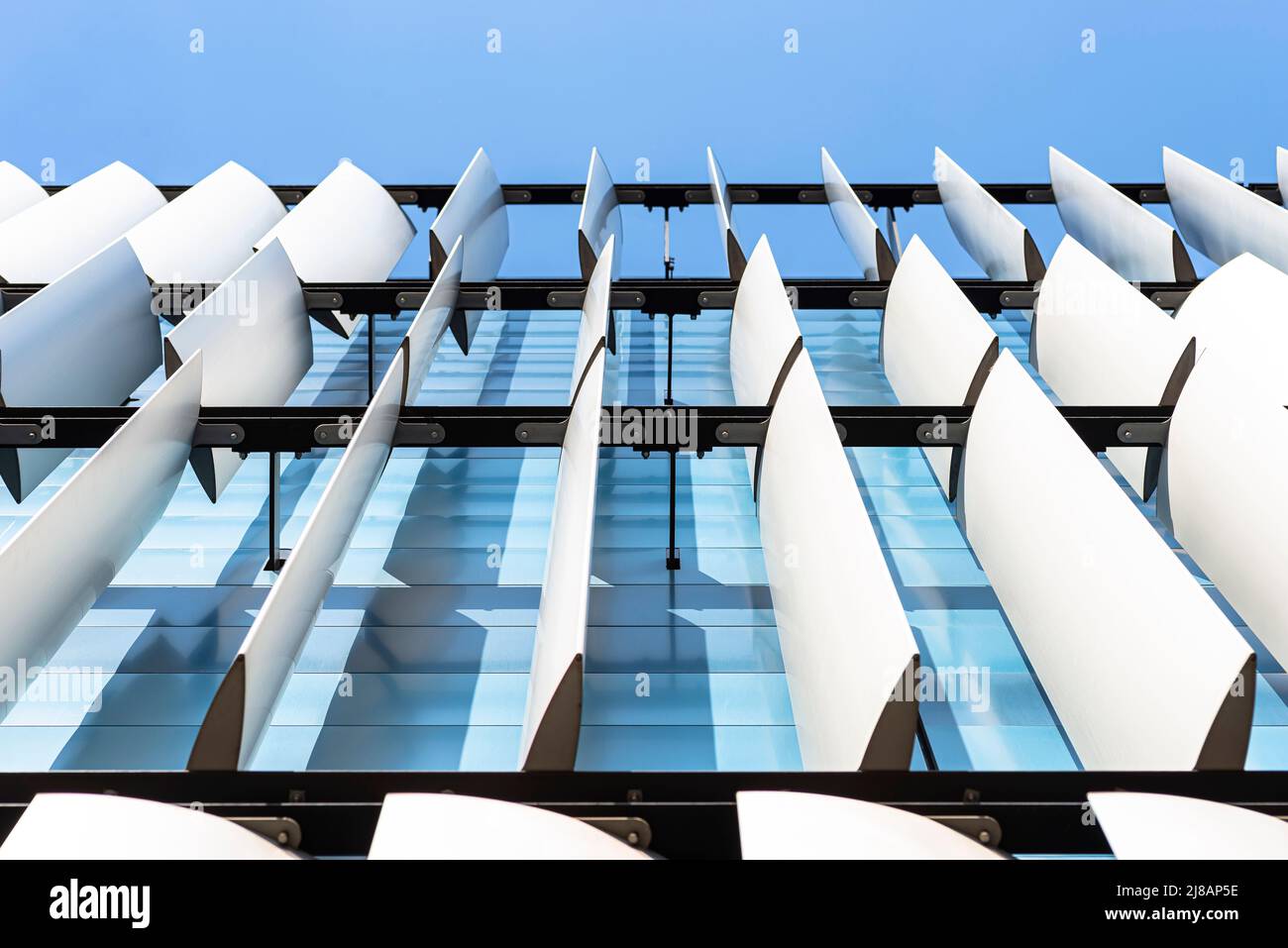 The facade of a modern building with an innovative facade made of ...