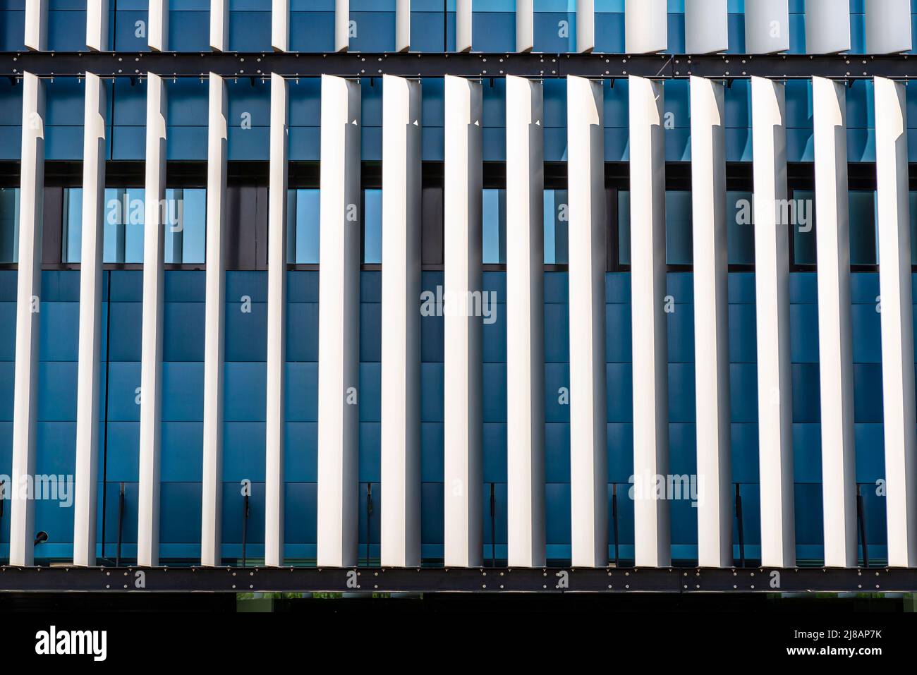 The facade of a modern building with an innovative facade made of ...