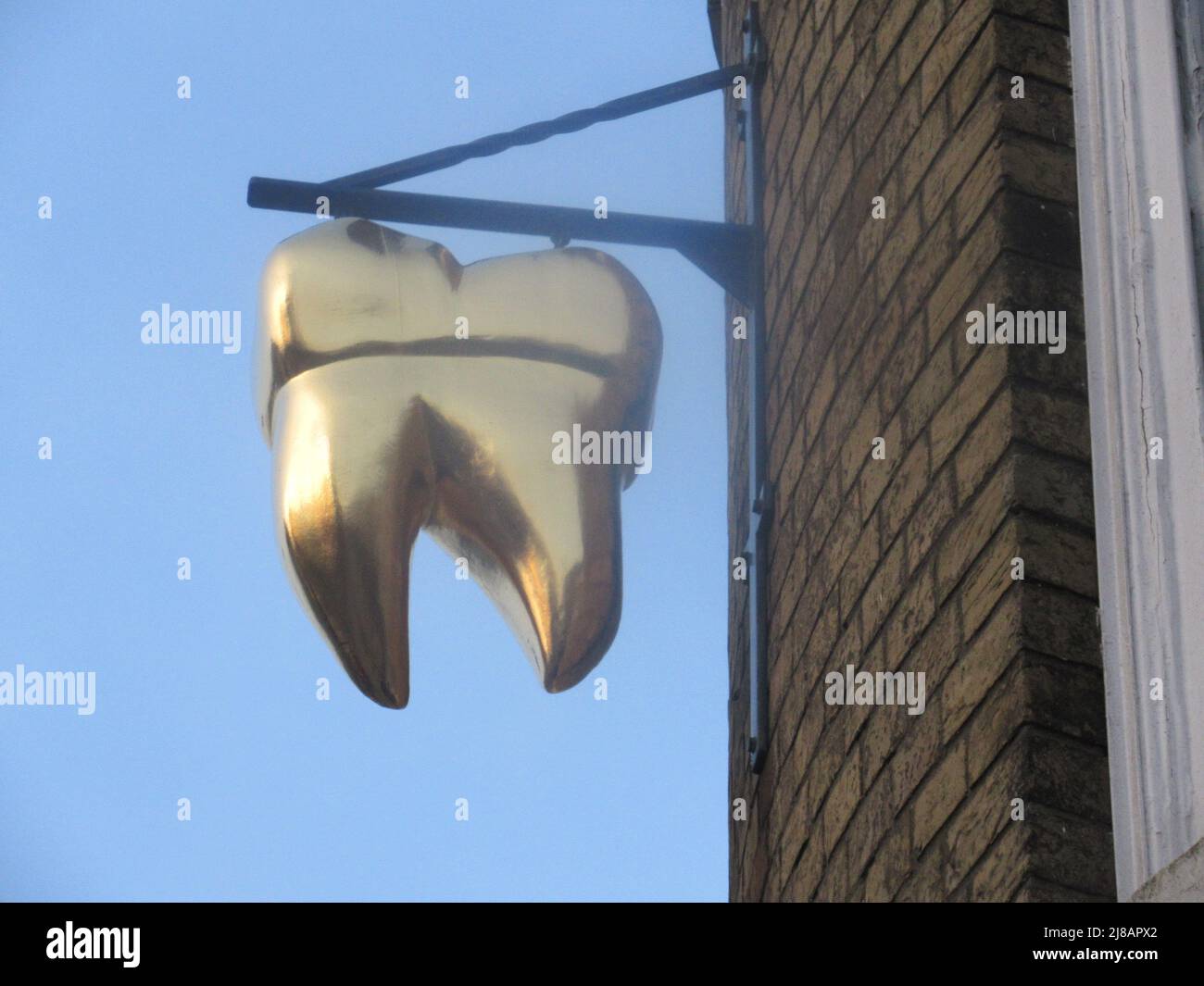 Clive Marks Dental Practice Golden Tooth Logo/Sign/Symbol Stock Photo ...