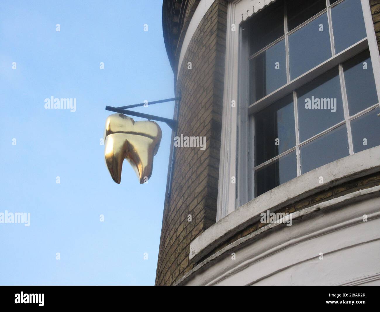 Clive Marks Dental Practice Golden Tooth Logo/Sign/Symbol Stock Photo ...