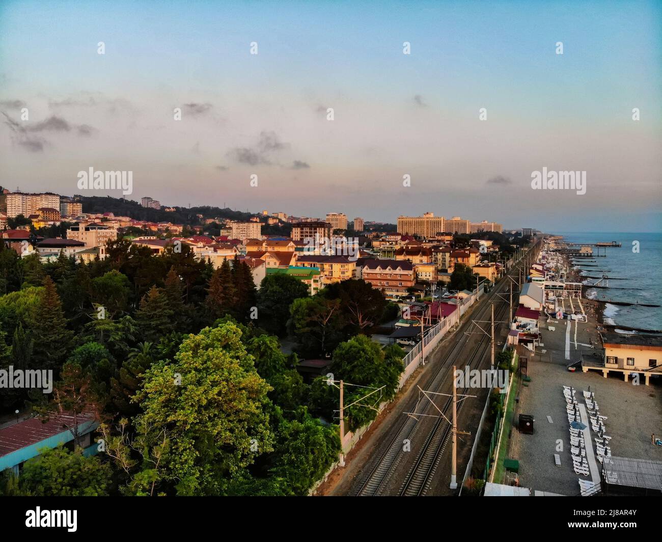 The coast of the Black Sea in Adler Russia. View of railways and top of ...