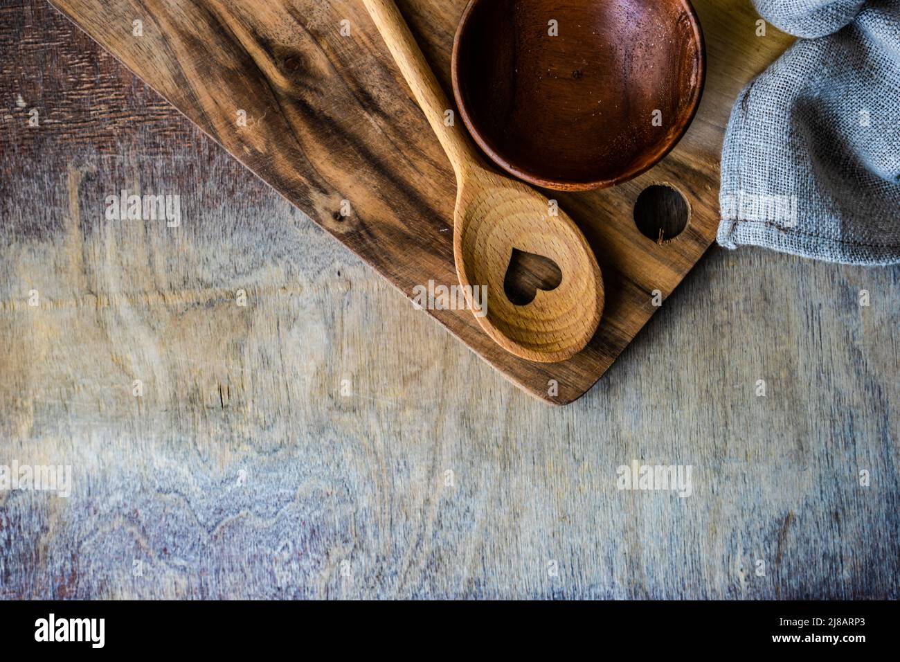 Useful kitchen cooking stuff on rustic table Stock Photo - Alamy