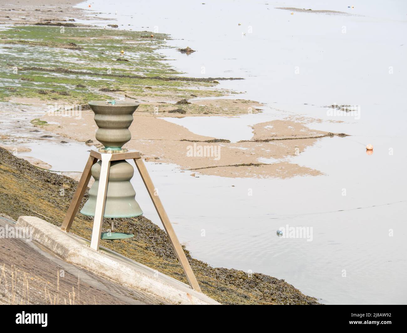 APPLEDORE, UK - APRIL 2 2021: The Tide and Time Bell, brass sculpture ...