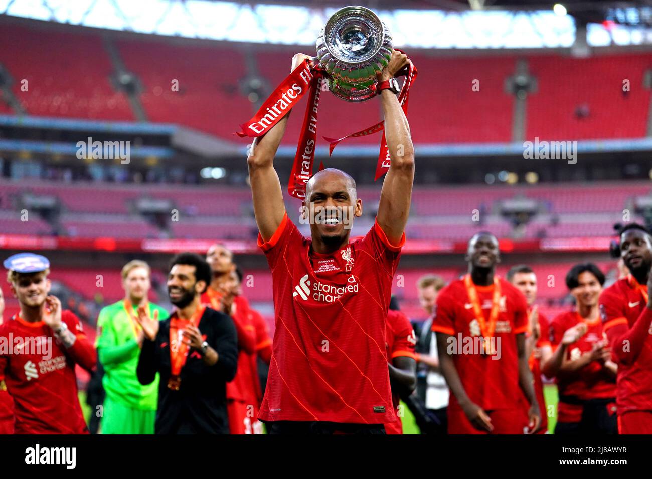 Liverpool's Fabinho celebrates with the trophy after winning the ...