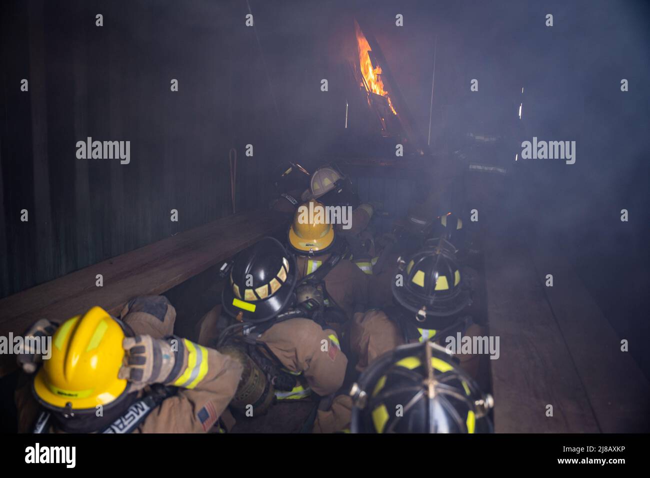 332d Expeditionary Civil Engineer Squadron firefighters sit inside the ...