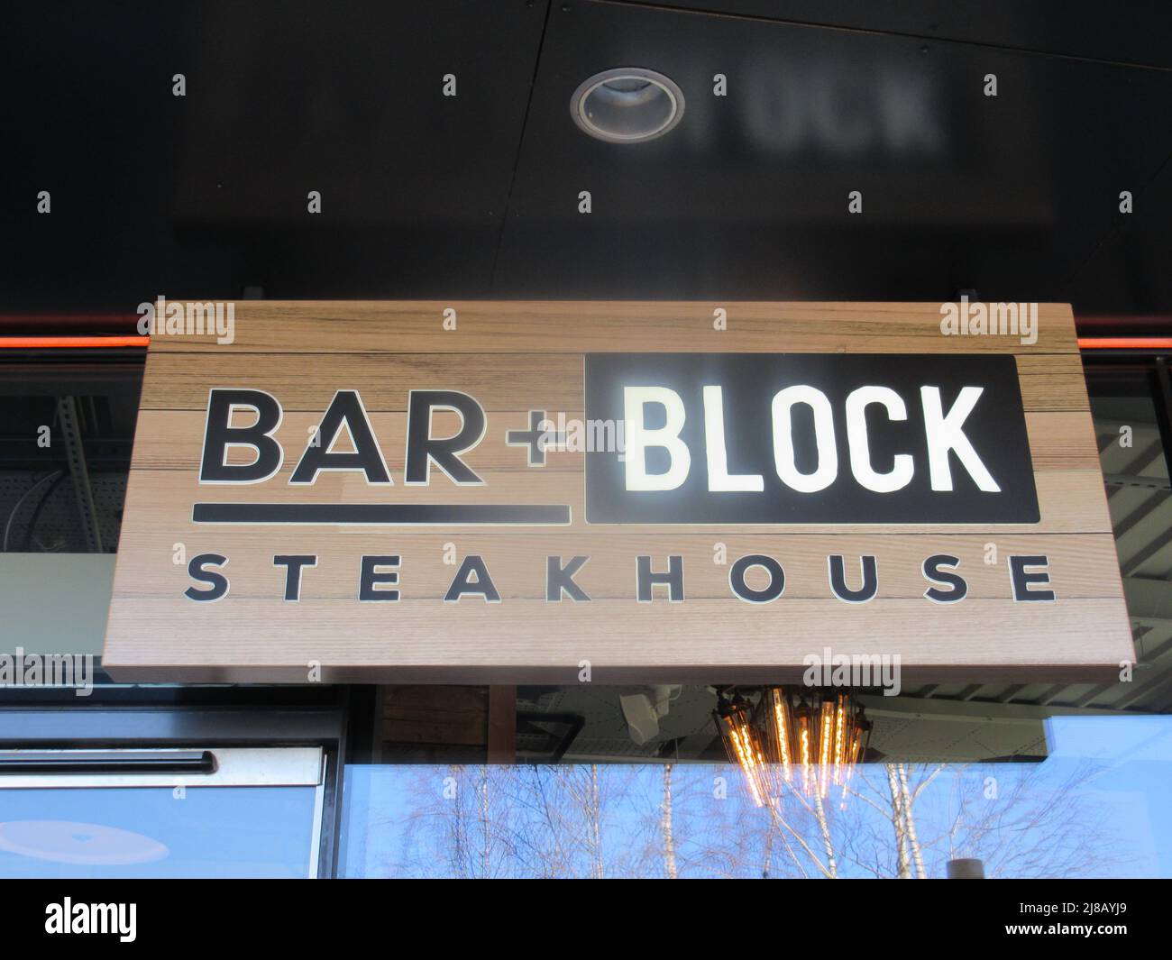 Bar + Block Steakhouse Restaurant Sign Stock Photo - Alamy