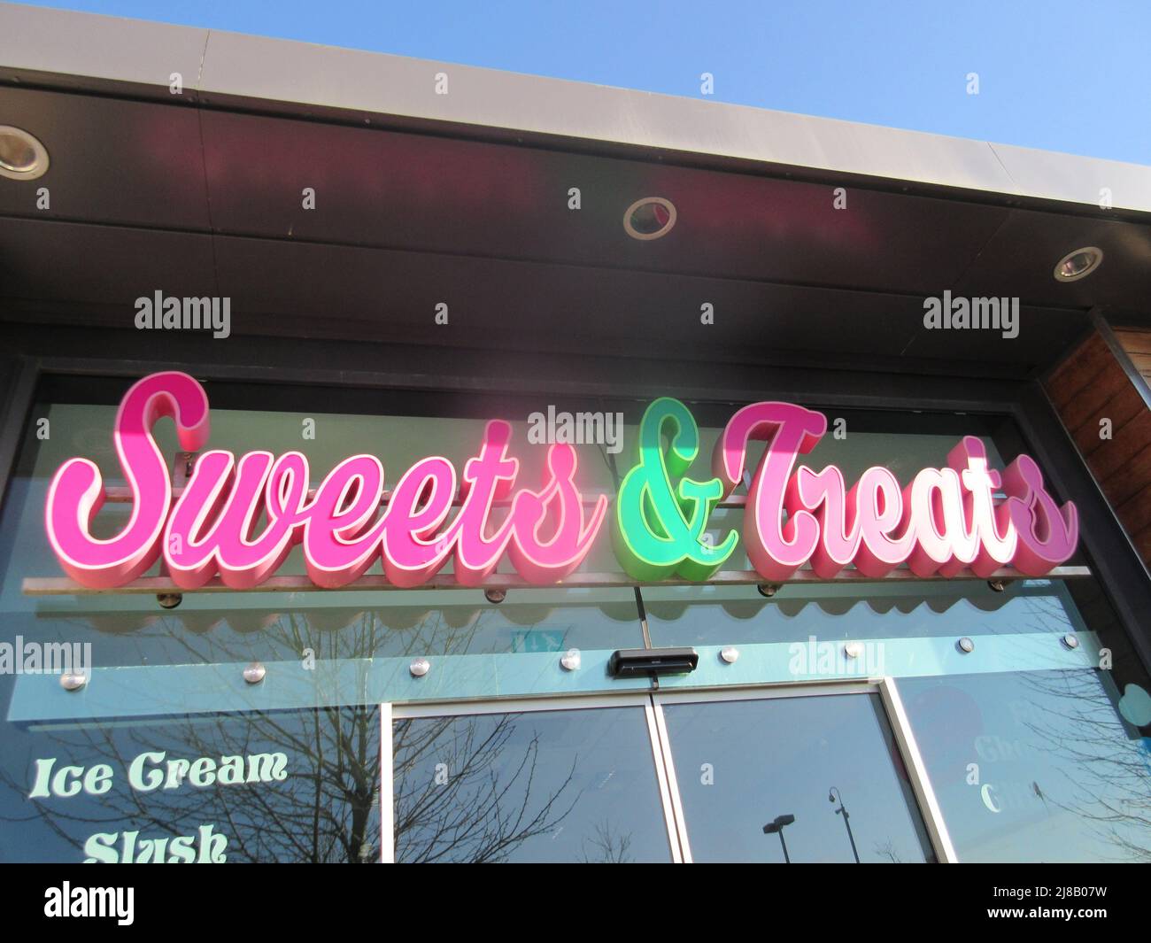 Sweets & Treats Sweet Shop Sign Stock Photo - Alamy