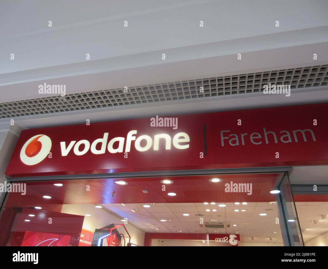 Vodafone Phone Shop Sign And Logo Stock Photo - Alamy