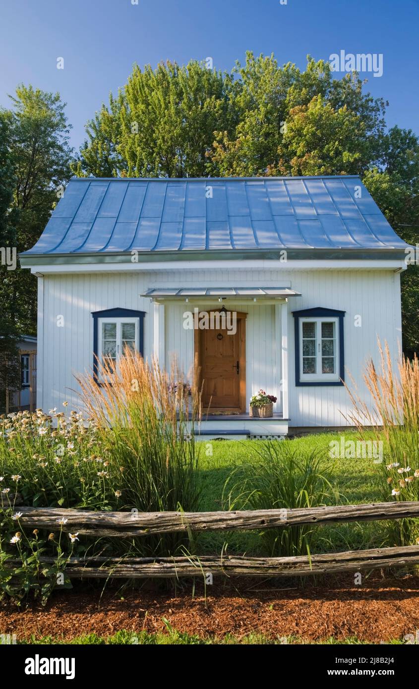 Small old circa 1866 Canadiana cottage style home with white clapboard ...