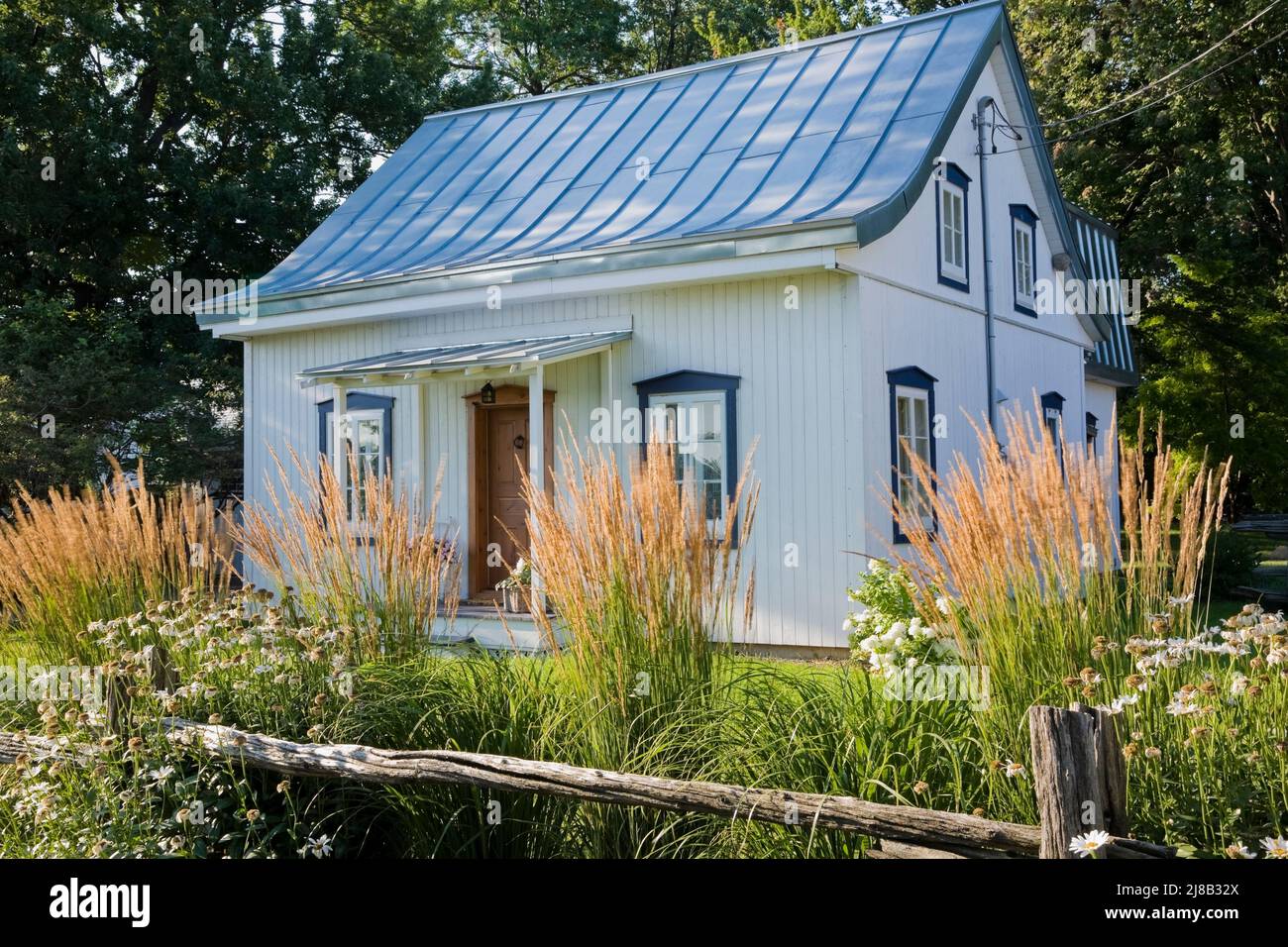 Small old circa 1866 Canadiana cottage style home with white clapboard ...