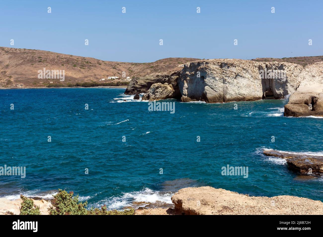 View of Milos island sea with rocks and waves Stock Photo - Alamy