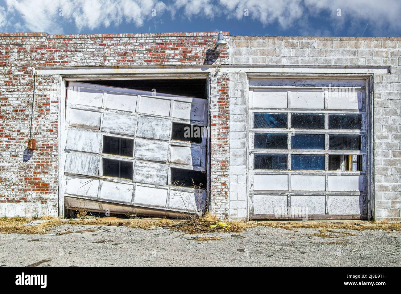 Aftermath of tornado - Commercial garage doors in vintage brick ...