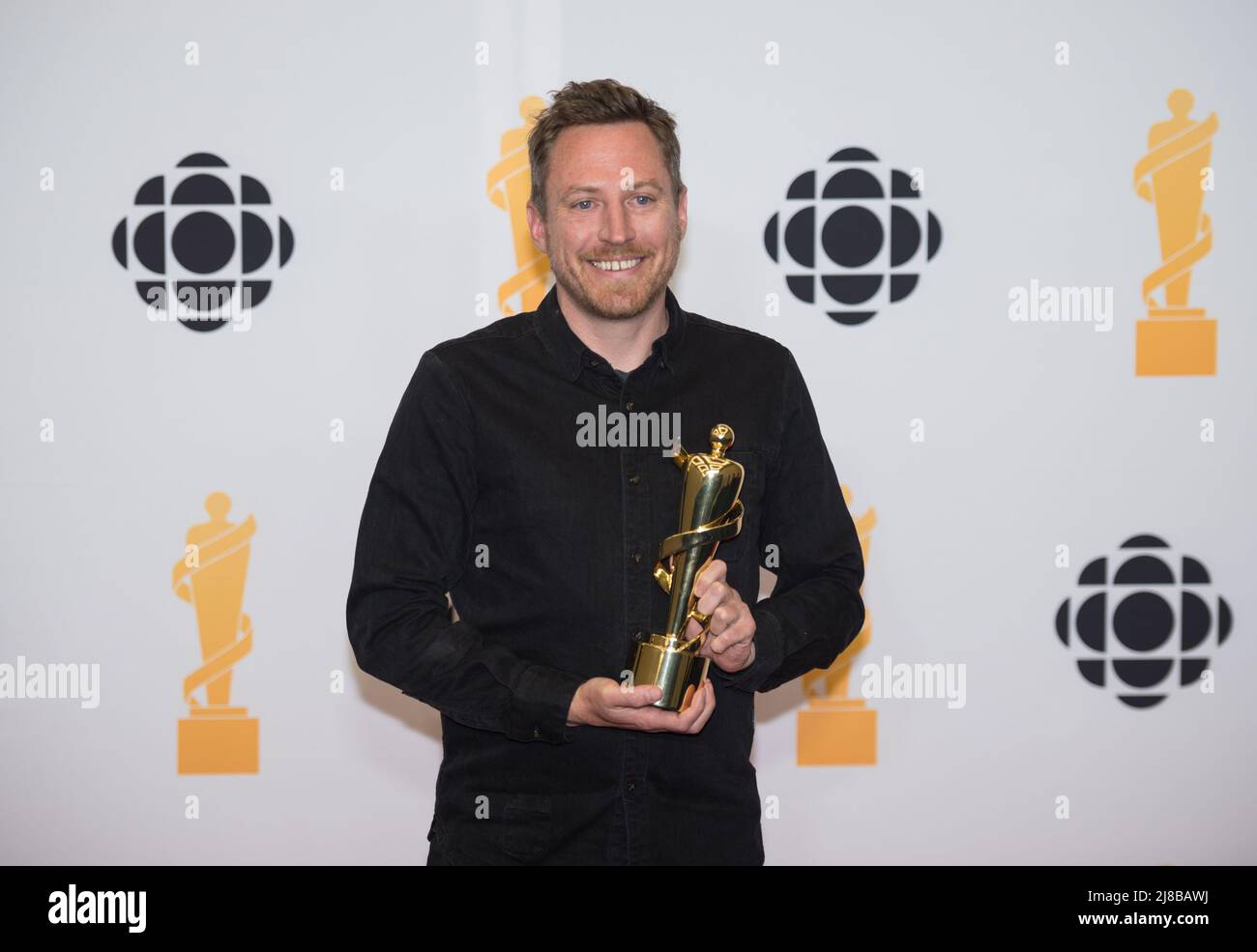 Tor poses for a photograph at the media wall after his album Oasis Sky ...