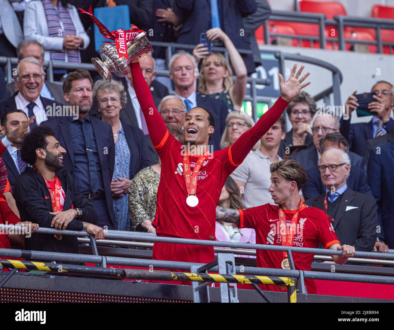 London, UK. 15th May, 2022. Liverpool's Virgil van Dijk (C) lifts the ...