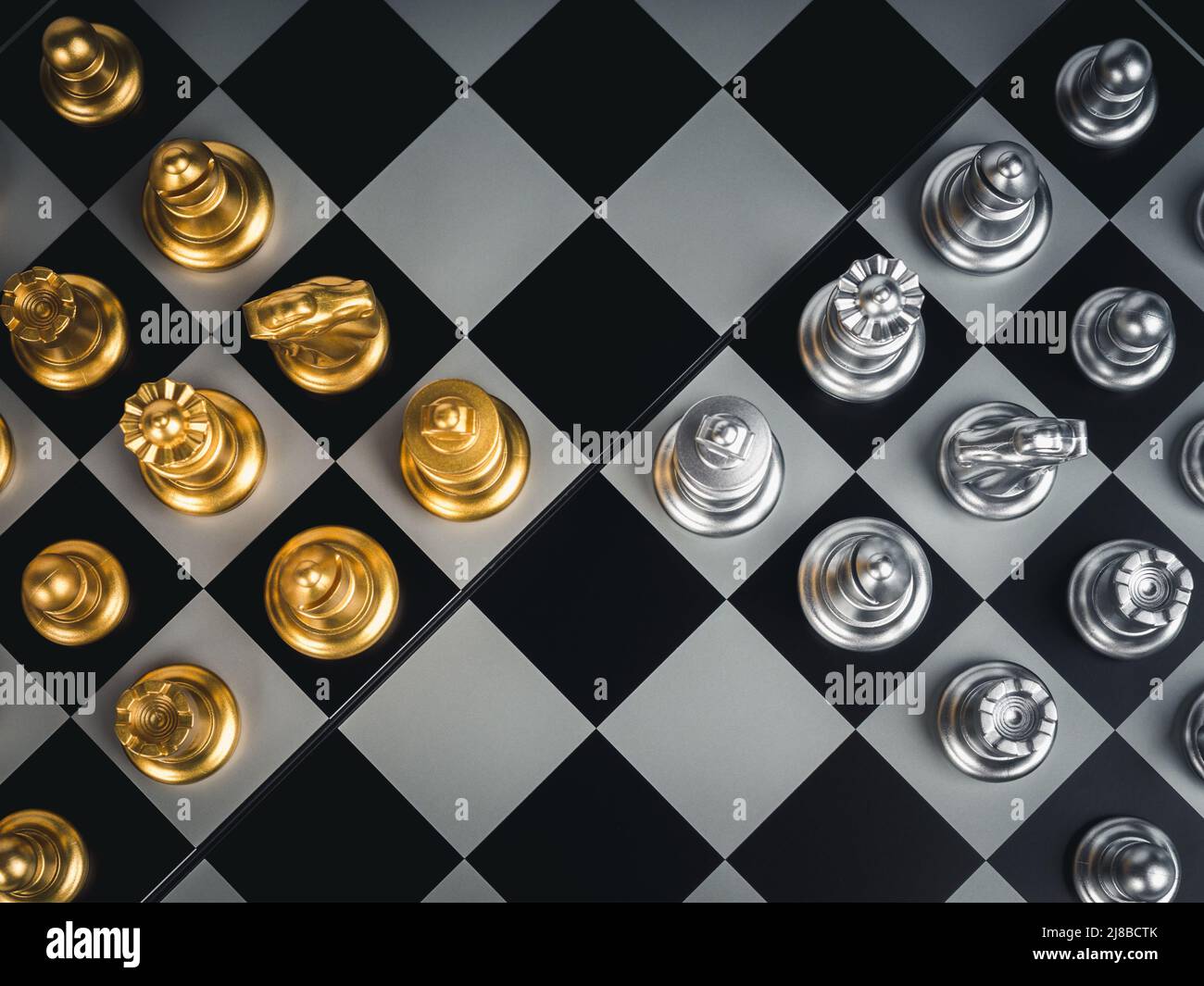 Top view of set of golden and silver chess pieces element, king, queen ...
