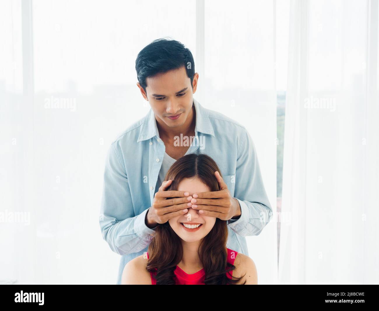 Making Surprise Lover Sweet Couple Concept Handsome Asian Man Using