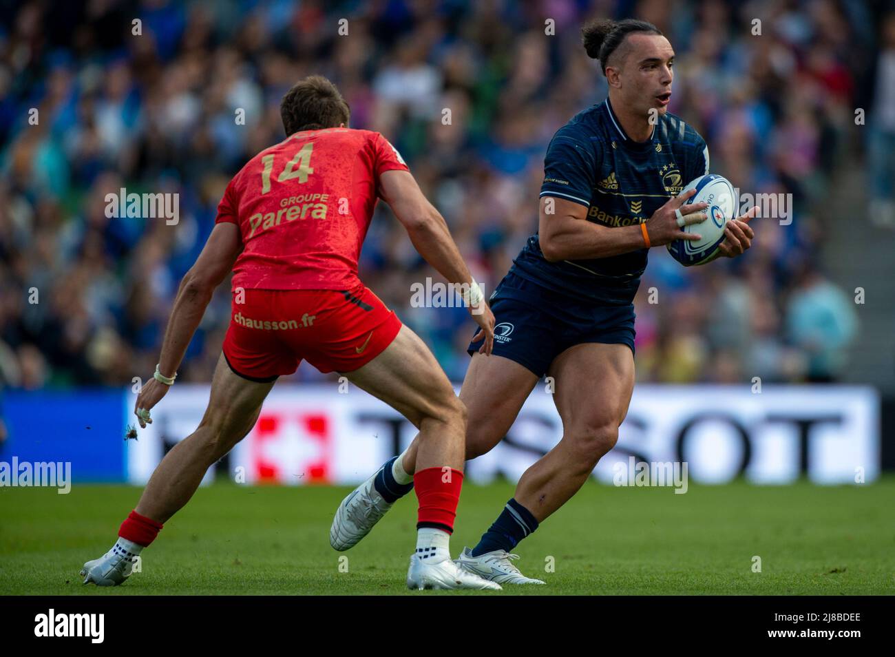 James Lowe of Leinster runs with the ball during the Heineken Champions ...