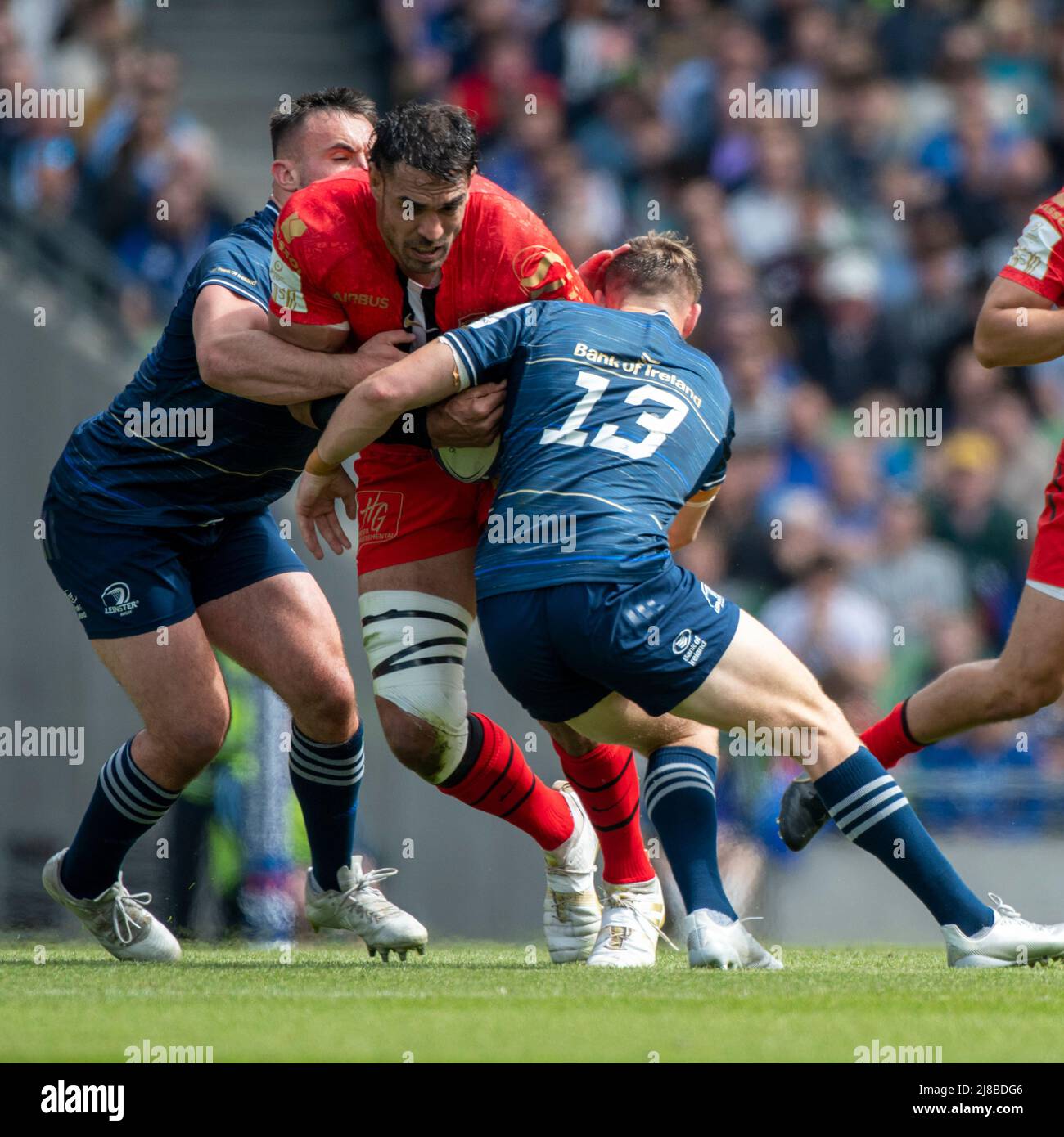 Rory Arnold of Toulouse tackled by Garry Ringrose of Leinster and Rónan ...