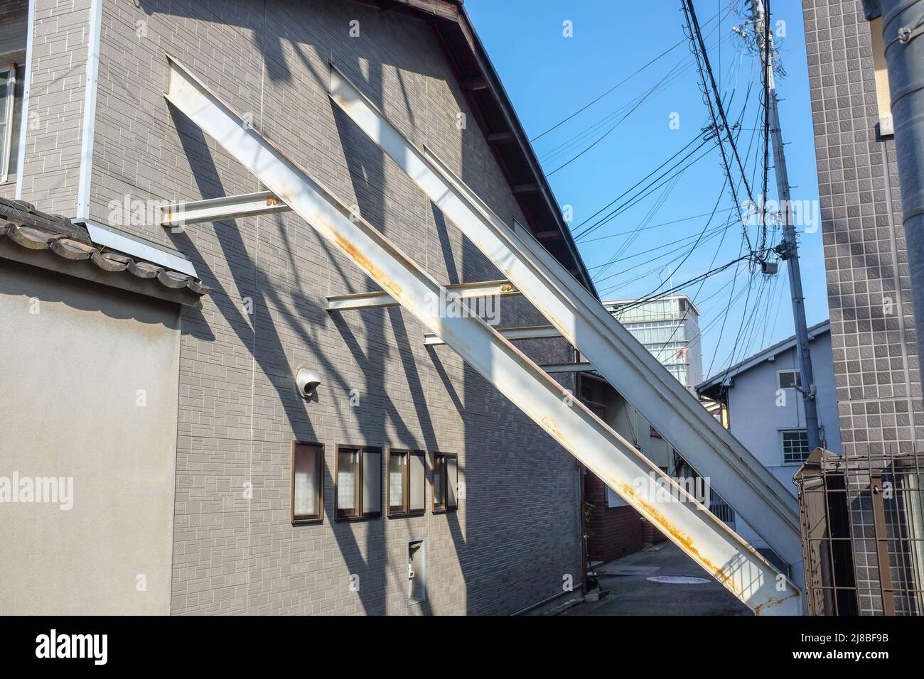 The exterior of a residential building in Kyoto City, Japan, with steel ...