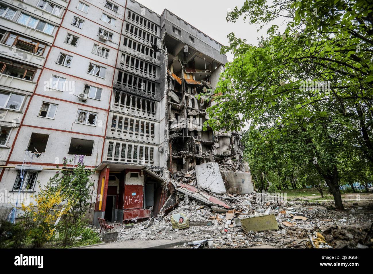 A destroyed residential building caused by Russian shelling seen in the ...