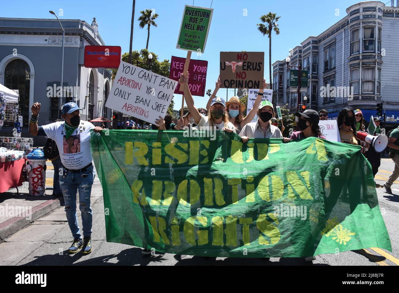 At the starting point of a pro-choice march across the city, banners ...