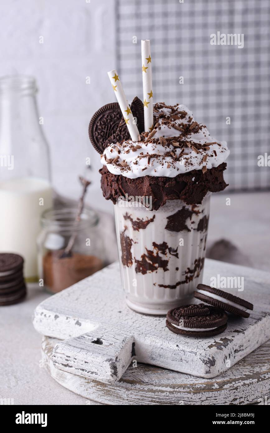 Sweet milkshake with whipped cream Stock Photo - Alamy